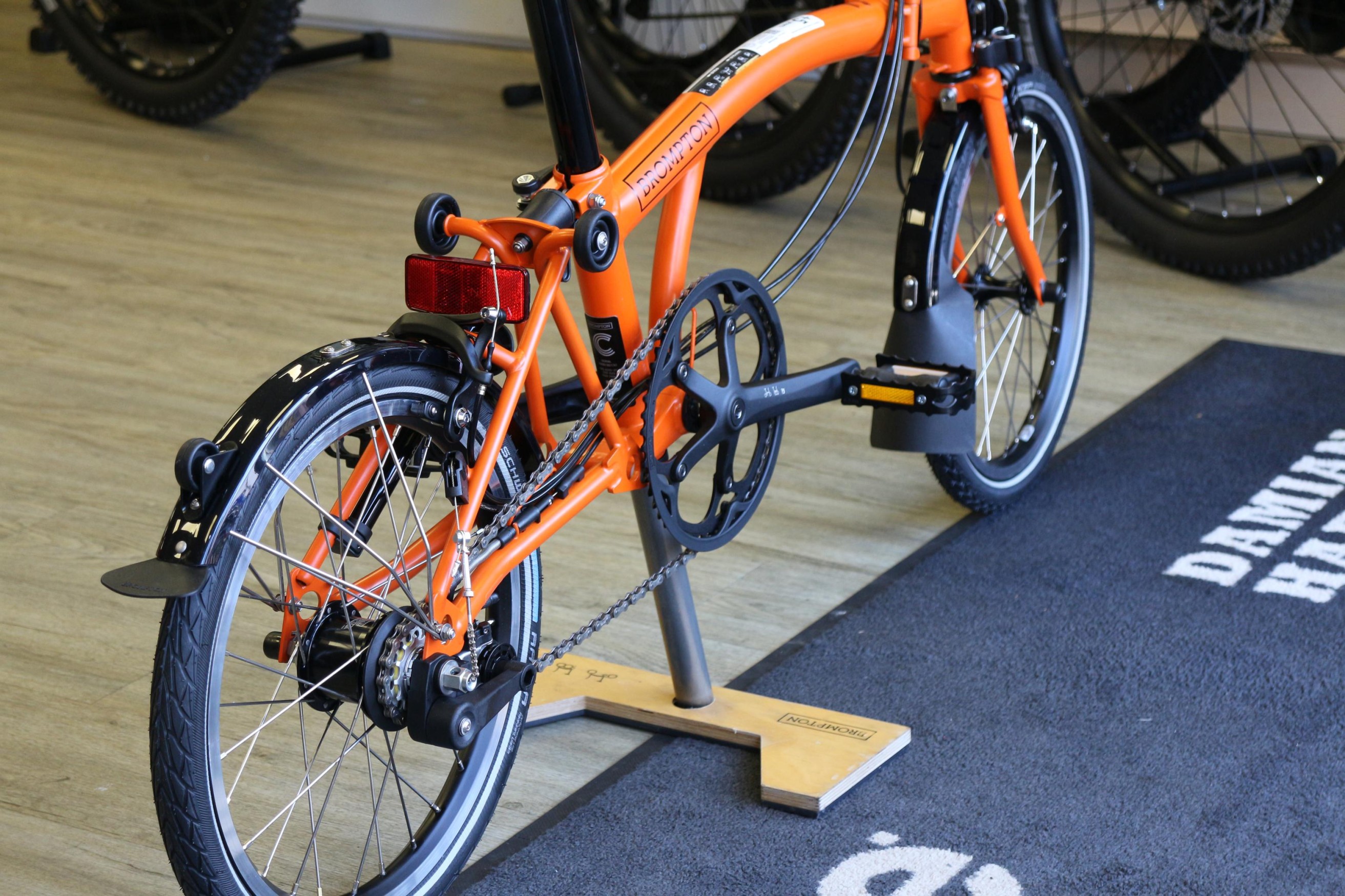 Brompton C Line Explore Low Sunset Orange 2024 Folding Bike Damian Harris Cycles E bike specialist Cardiff UK
